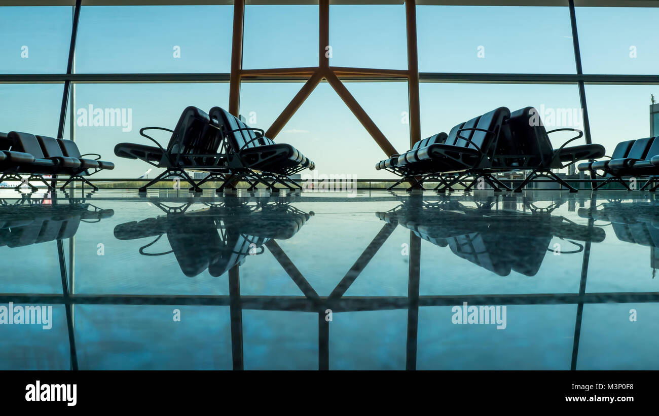Empty empty airport terminal with passenger seats Stock Photo - Alamy