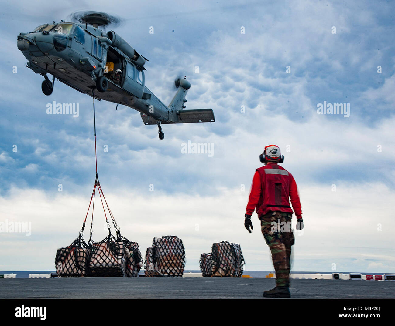 Sailors train aboard USS Wasp while in transition to Sasebo, Japan by # ...