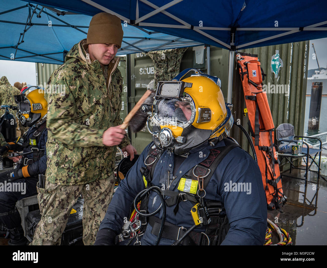 U.S. Navy Construction Mechanic 3rd Class Lucas Jackson, assigned to ...