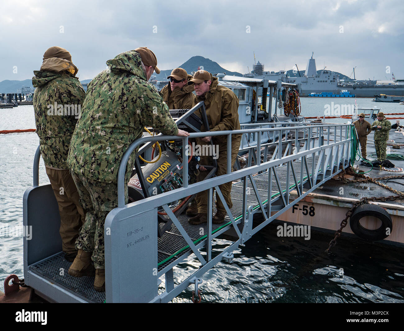 U.S. Navy Seabees, assigned to Underwater Construction Team (UCT) 2 ...