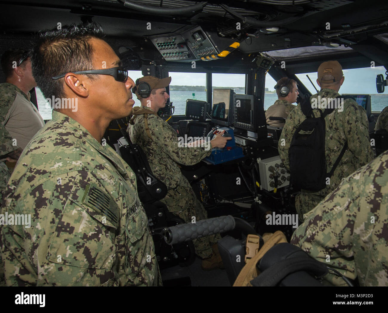 U.S. Navy Sailors, assigned to Coastal Riverine Squadron (CRS) 2 ...