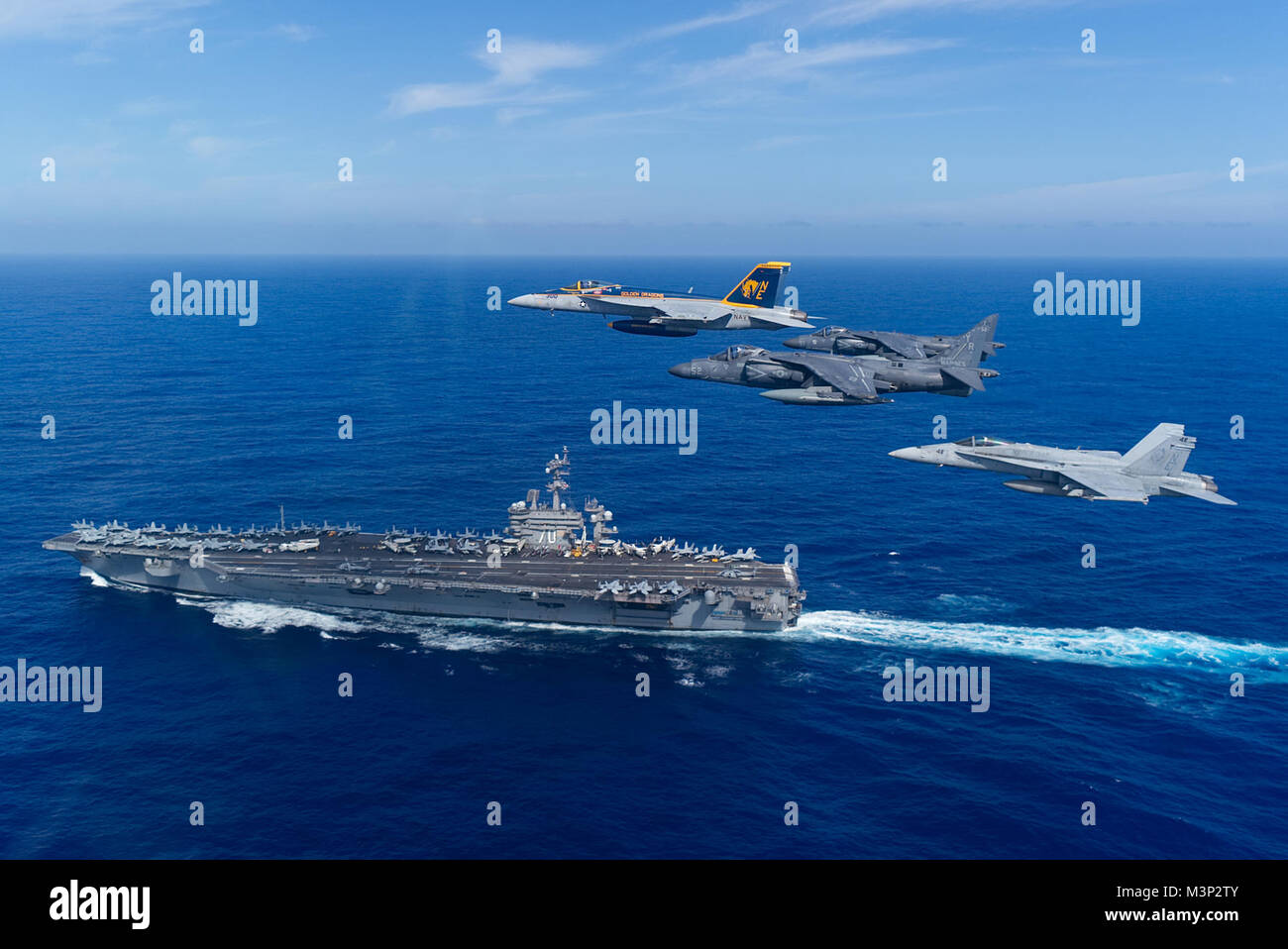 180120-N-ZZ999-0002 PACIFIC OCEAN (Jan. 20, 2018) Two AV-8B Harriers ...