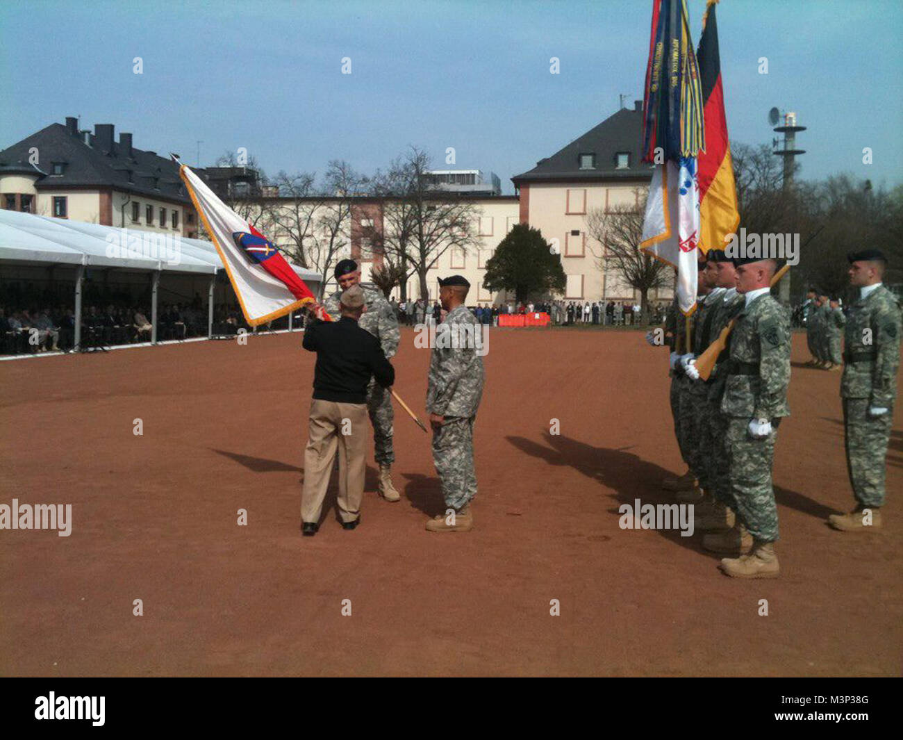 Adm. James Stavridis, commander of the U.S. European Command (back to camera) passes the U.S ...