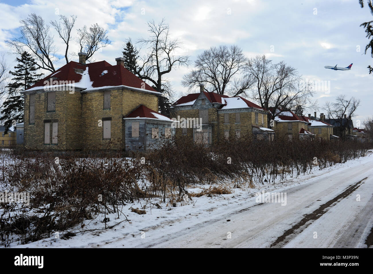 Abandoned homes seen in the snow during winter in Minneapolis ...