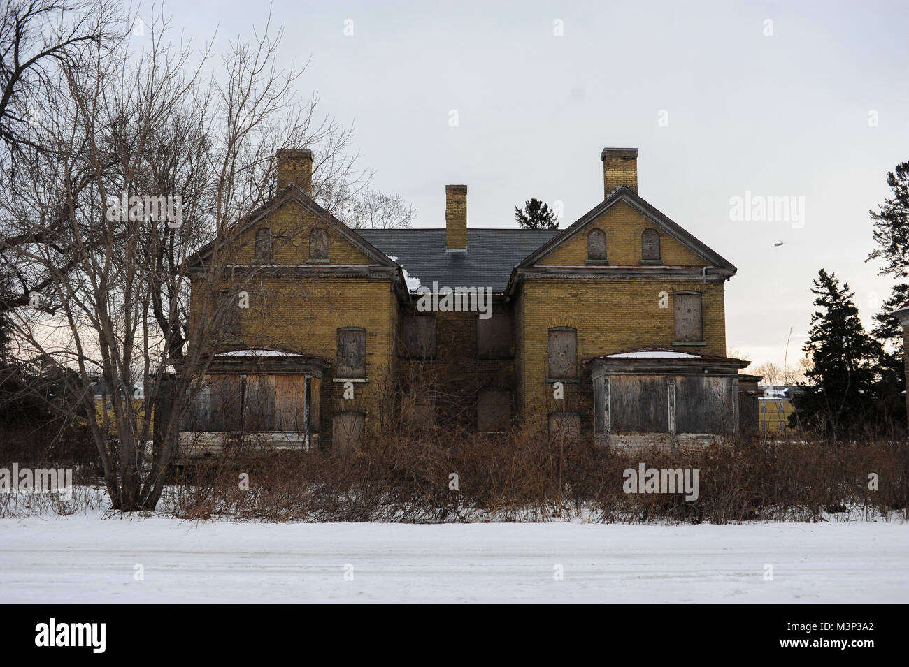 Abandoned homes seen in the snow during winter in Minneapolis ...