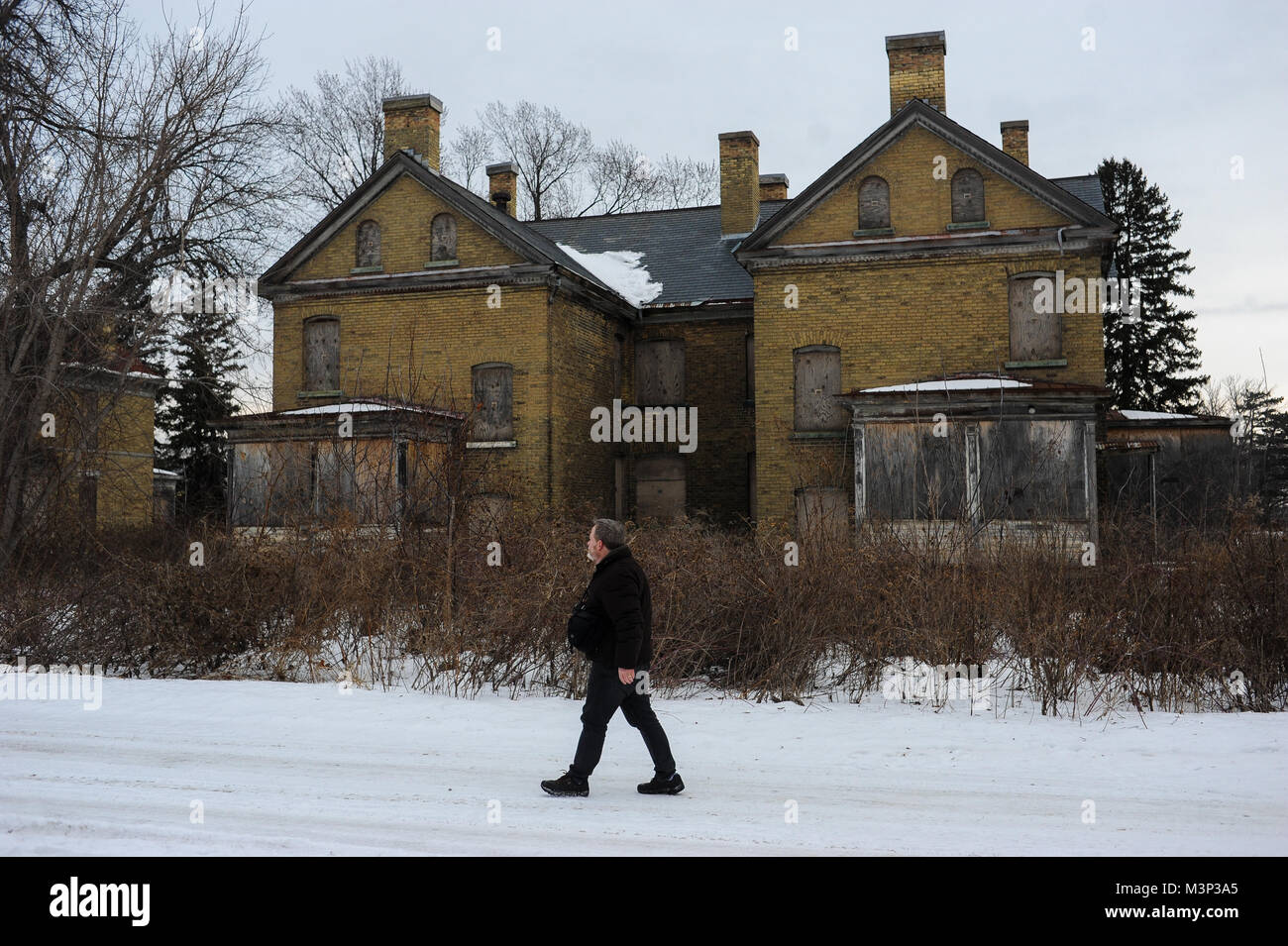 Abandoned homes seen in the snow during winter in Minneapolis ...