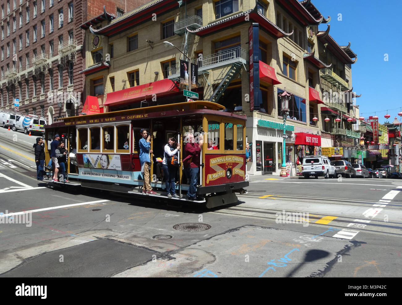 SAN FRANCISCO Ca. - JUNE 16: Passengers ride in a cable car JUNE 16 ...