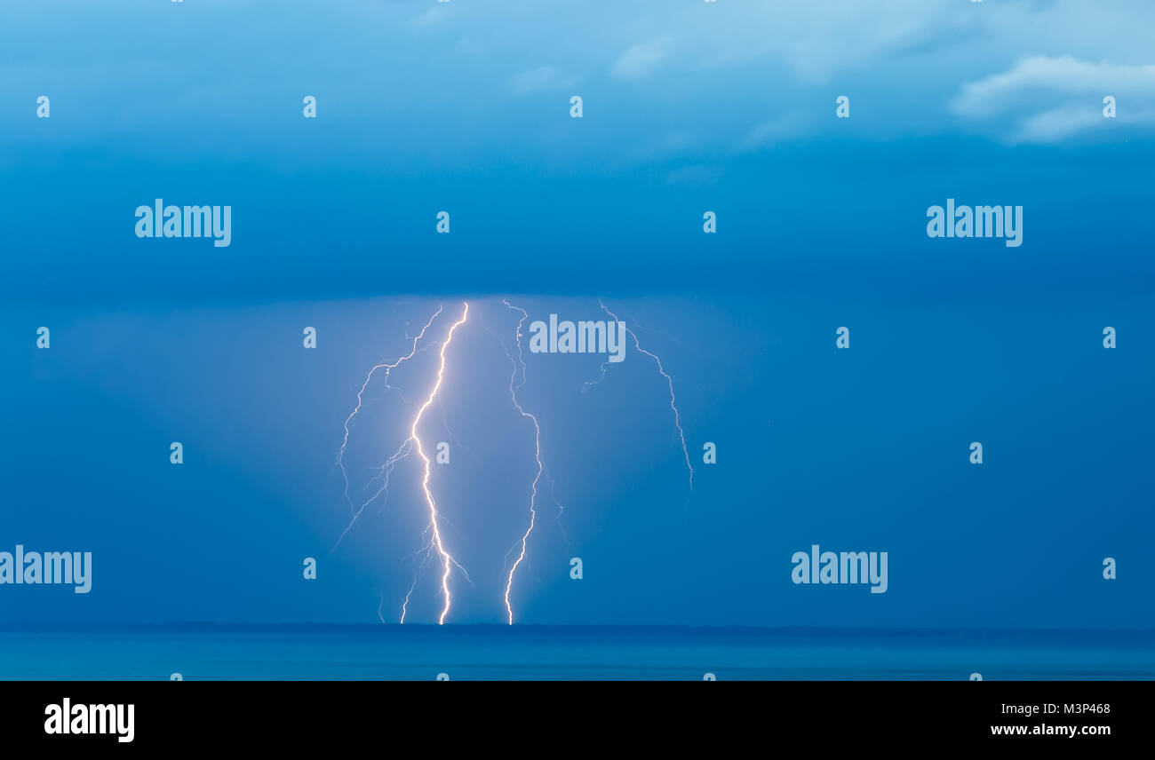 Thunder storm lightning strike on the sea background at night Stock ...