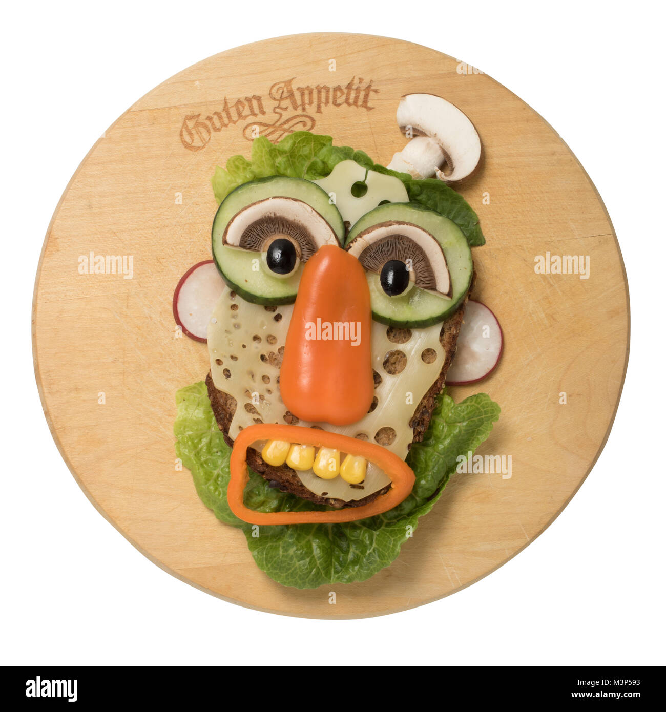 Chef made with bread and vegetables on cutting board Stock Photo - Alamy