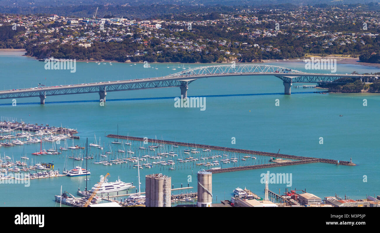 Blue clear water under Auckland harbour bridge Stock Photo - Alamy