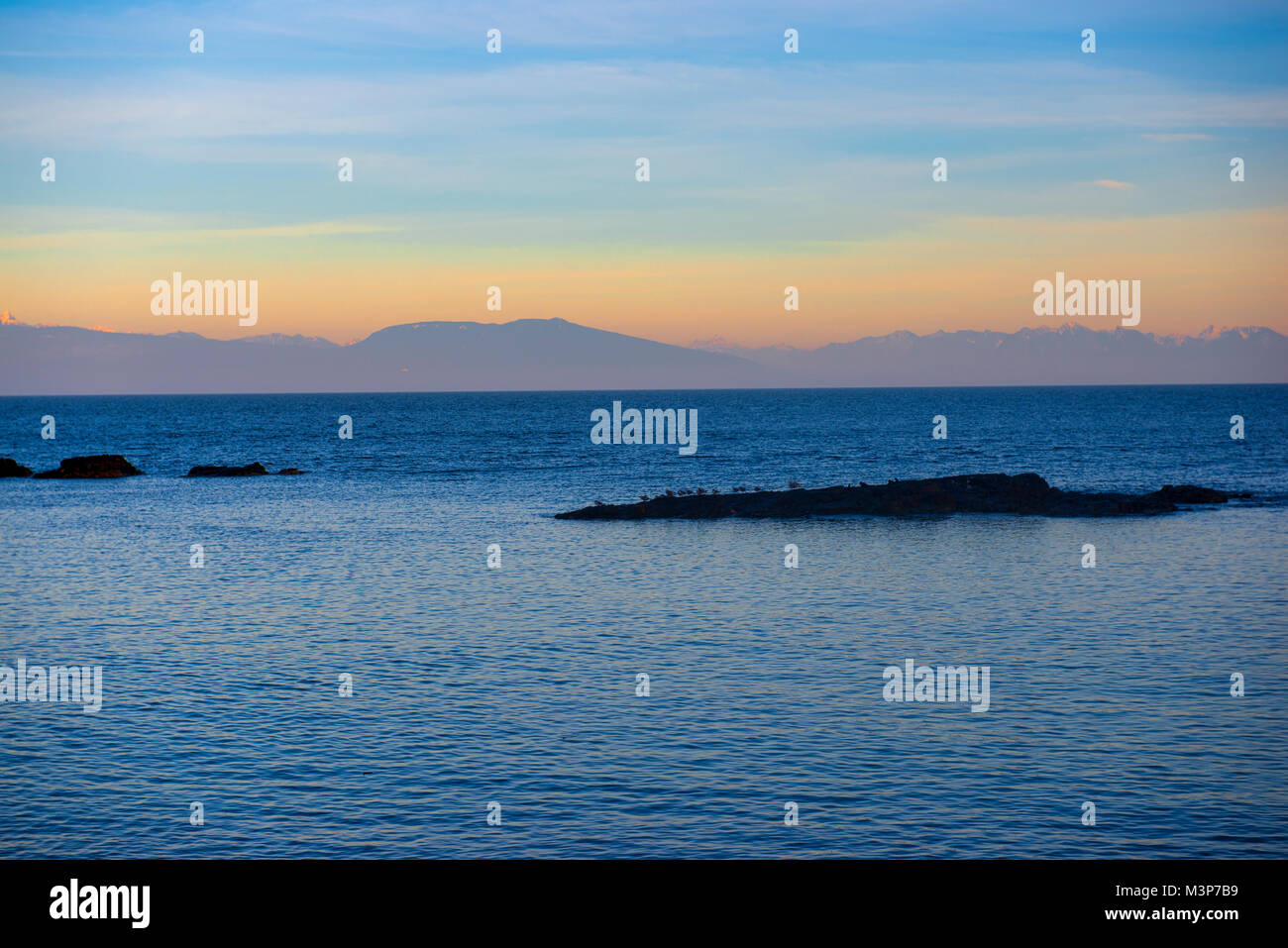 Detail of rock formation and the ocean overlooking the Strait of ...