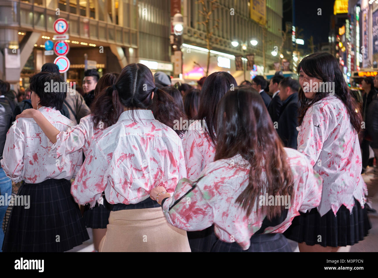 Japanese girls dressed in school uniforms with blood on shirts at the ...