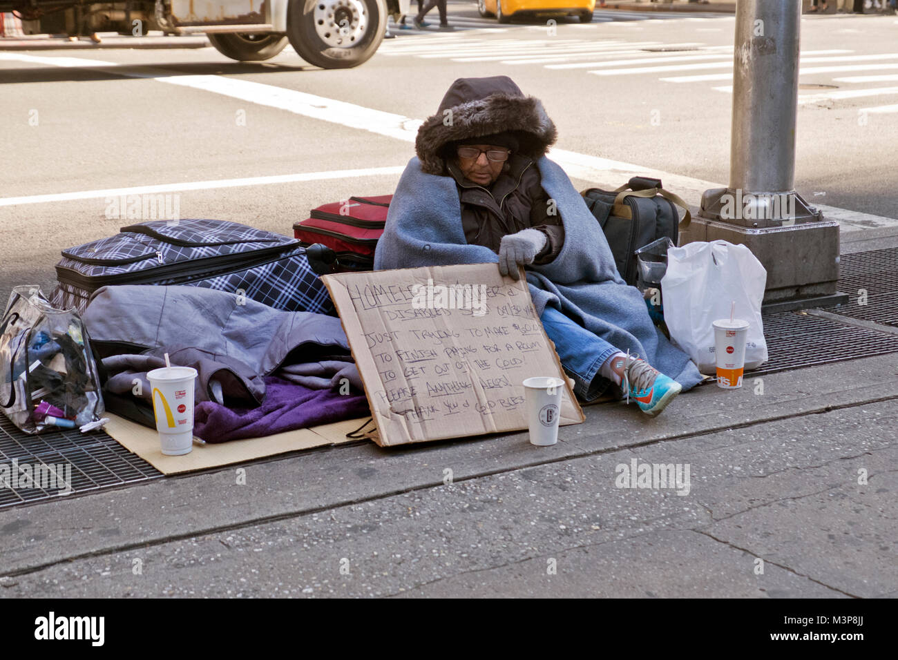 Homeless women on Manhattan street in New York City begging for some ...