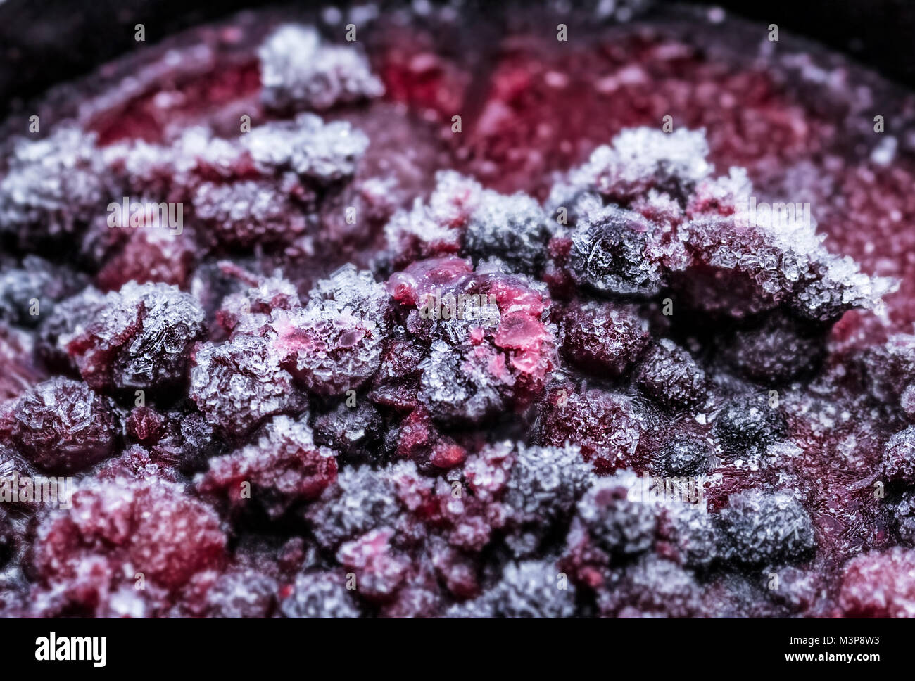 Frozen multi colour berries in frost from freezer Stock Photo - Alamy