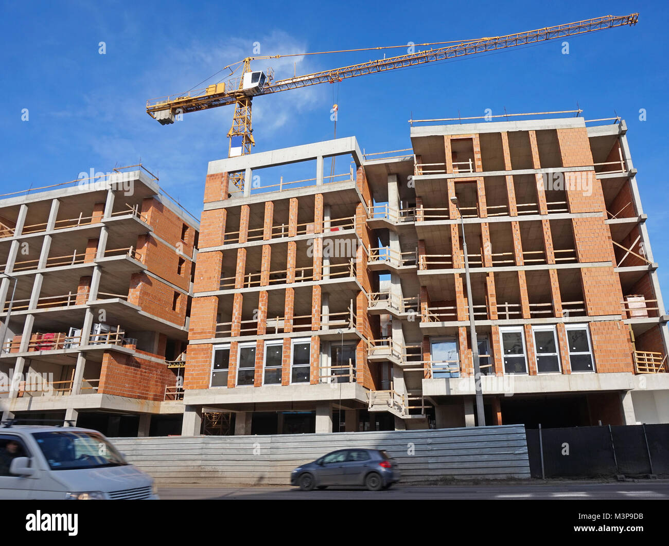 Construction of a new apartment building in the city Stock Photo - Alamy