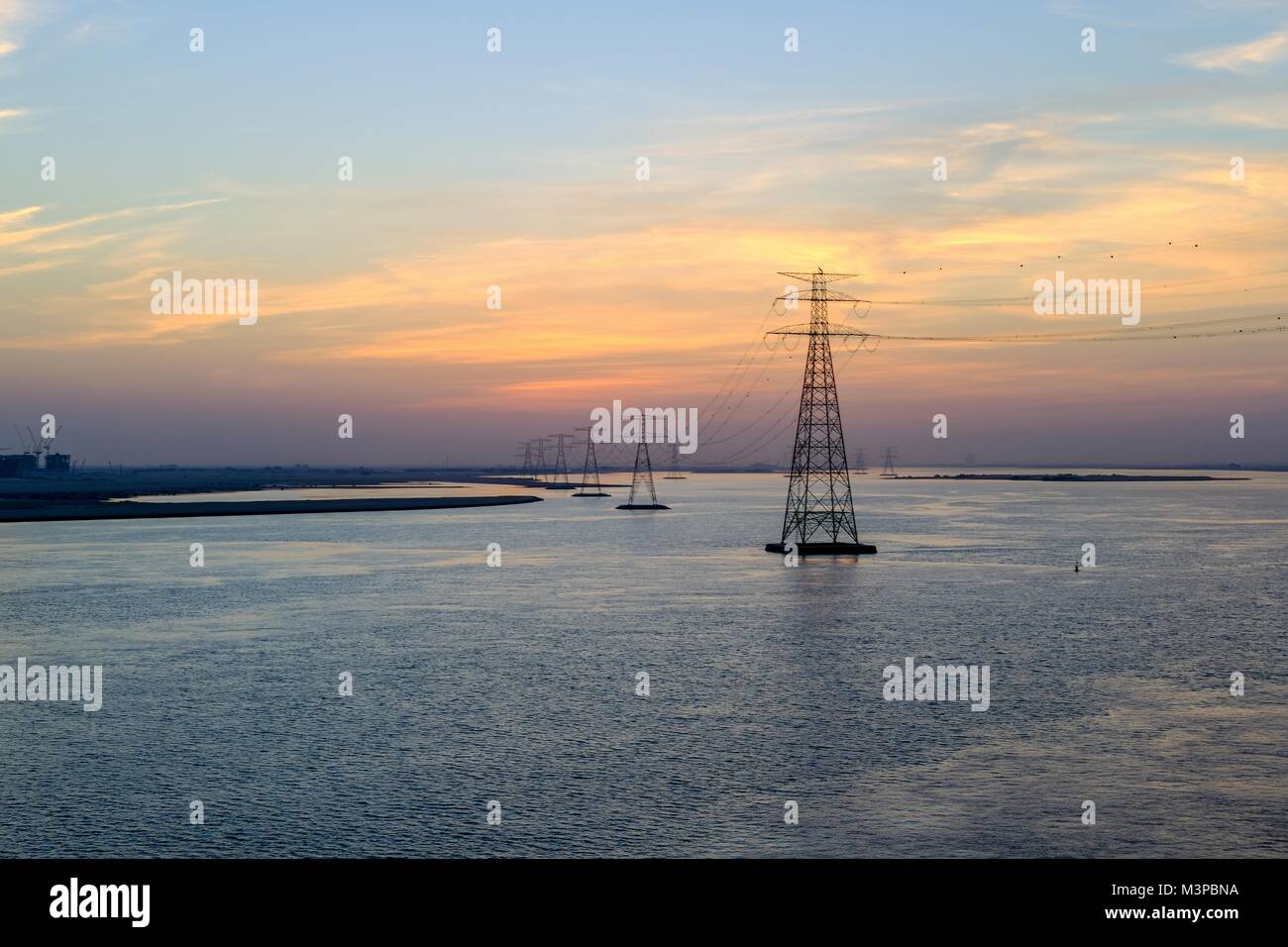 High voltage Electricty Power lines distributed through Ocean with ...