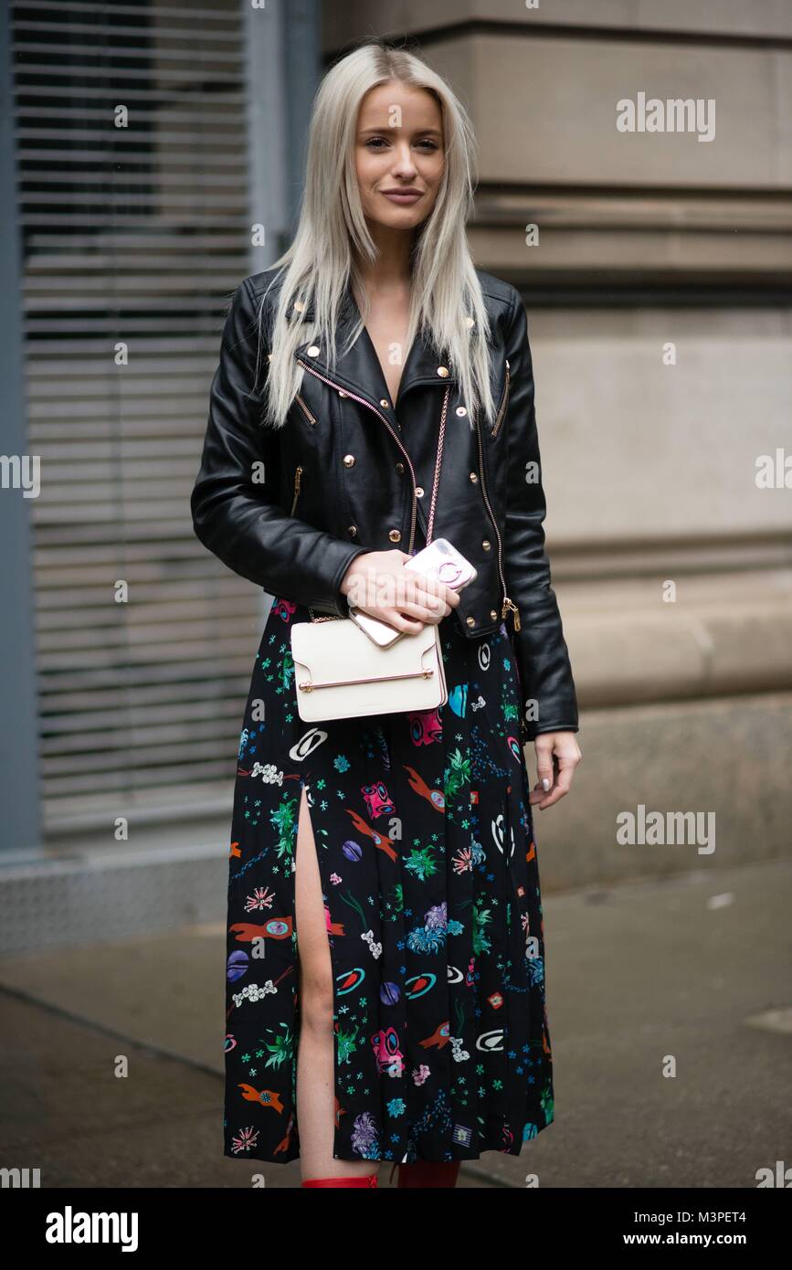 New York City, USA. 11th Feb, 2018. A chic showgoer arriving for the ...