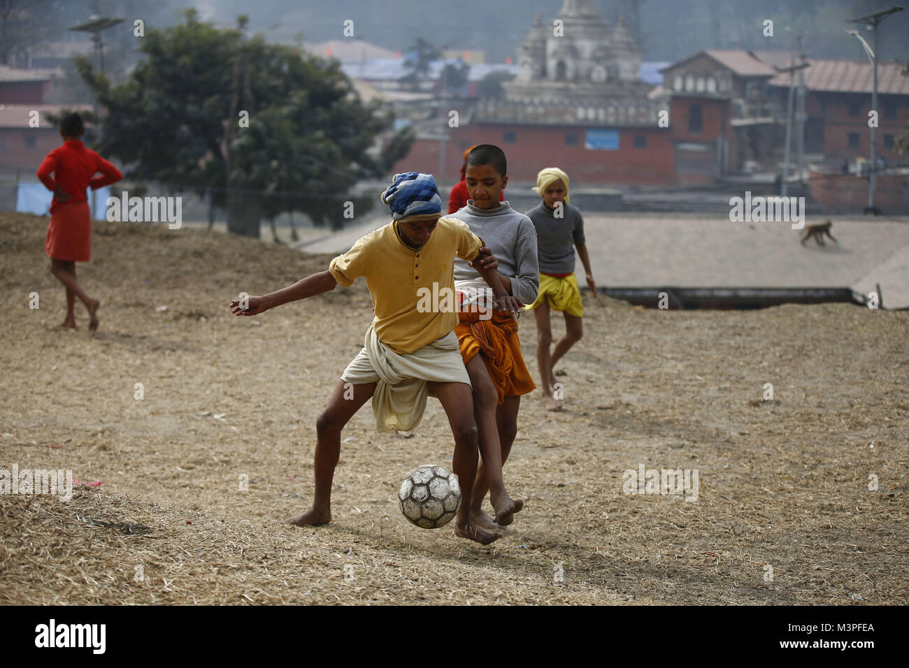Kathmandu, Nepal. 12th Feb, 2018. Young Nepalese priests play football ...