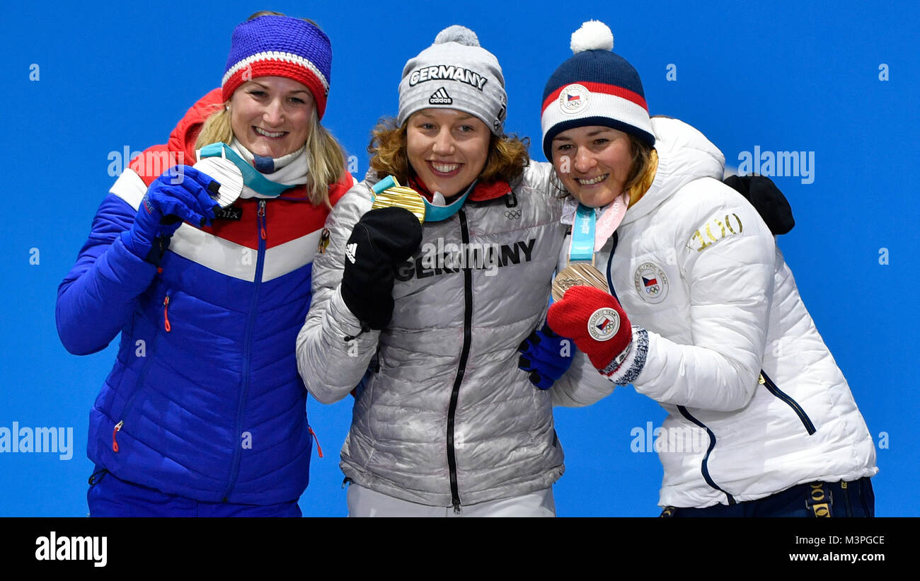 L-R Norwegian biathlete Marte Olsbu (silver medal), German biathlete ...