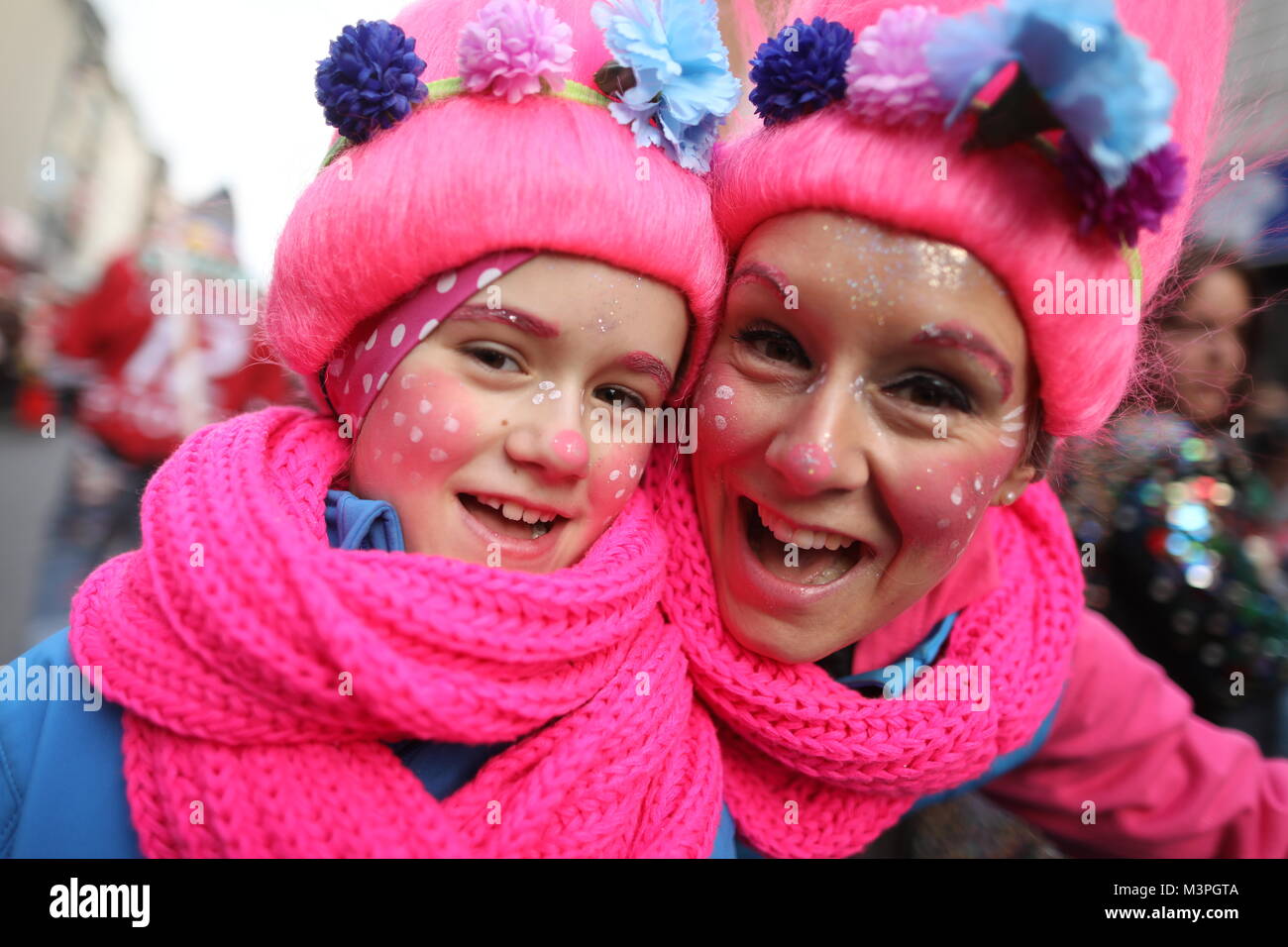 Carnival-goers Silvia and her daughter Leni are dressed as pink elves ...