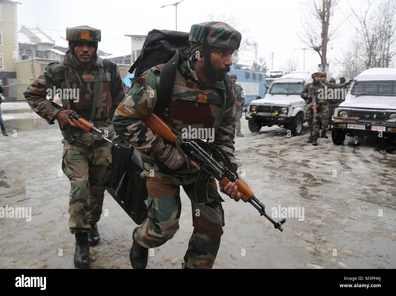 Srinagar, Kashmir. 12th Feb, 2018. Indian army troopers arrive at the ...