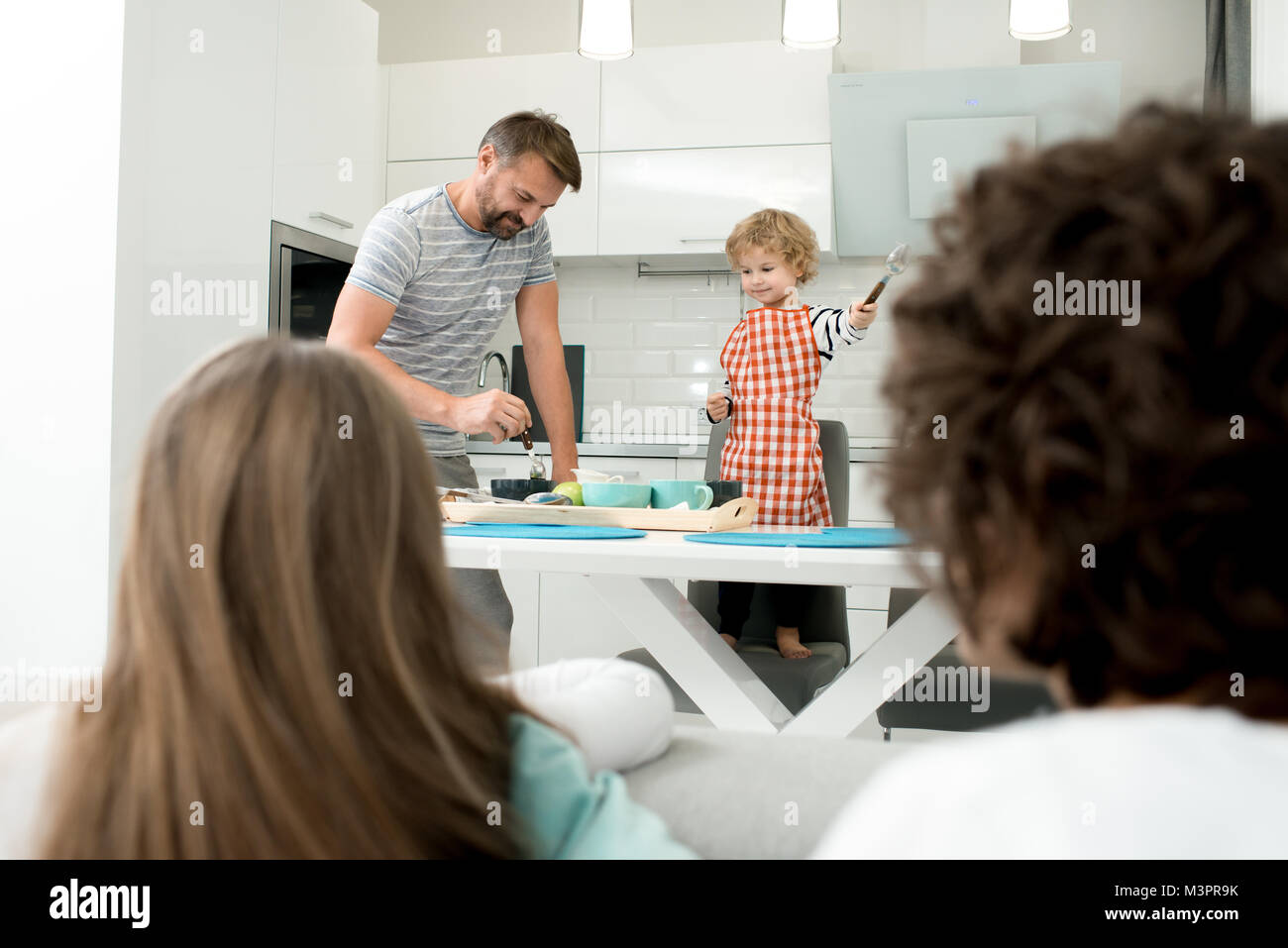 Father and Son Cooking Together Stock Photo - Alamy