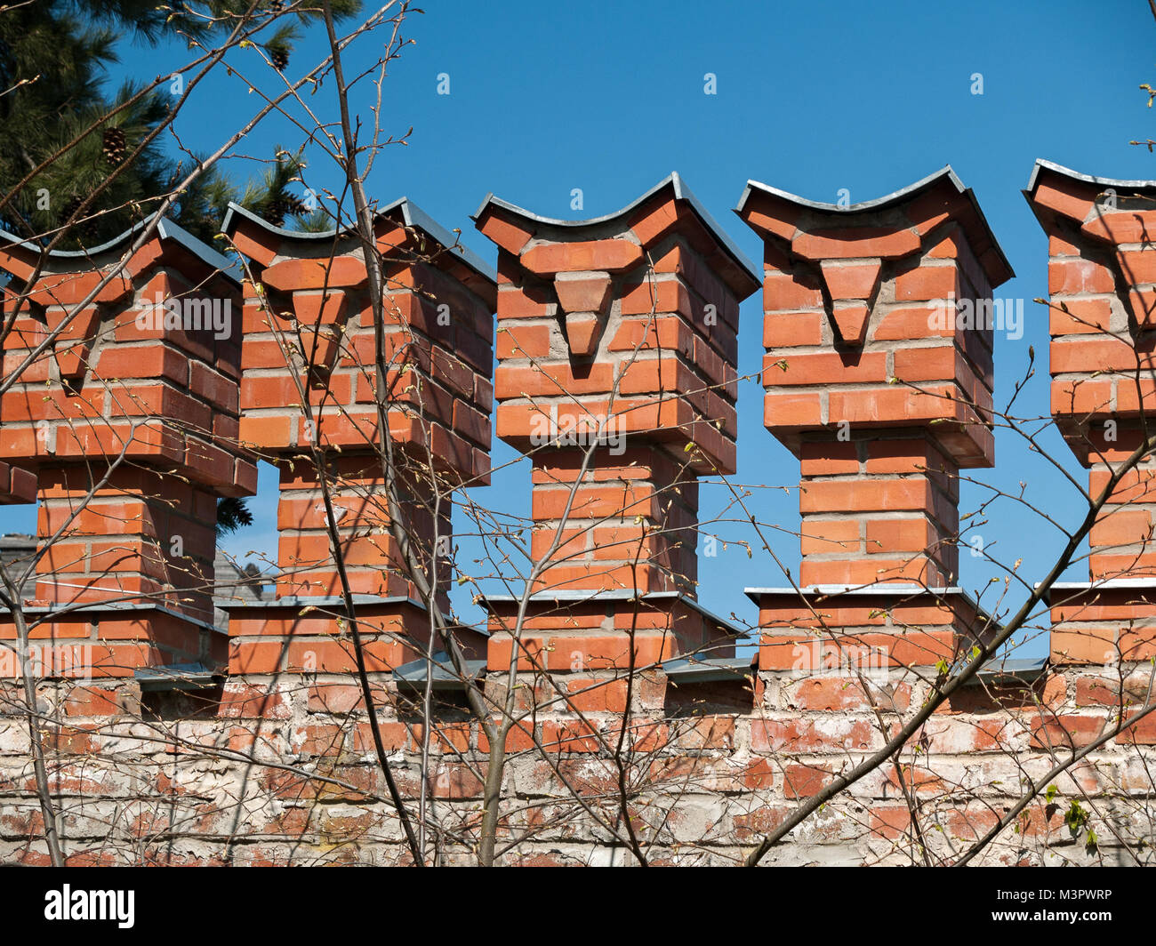 Fragment of the fortified wall of red brick in the architectural ...