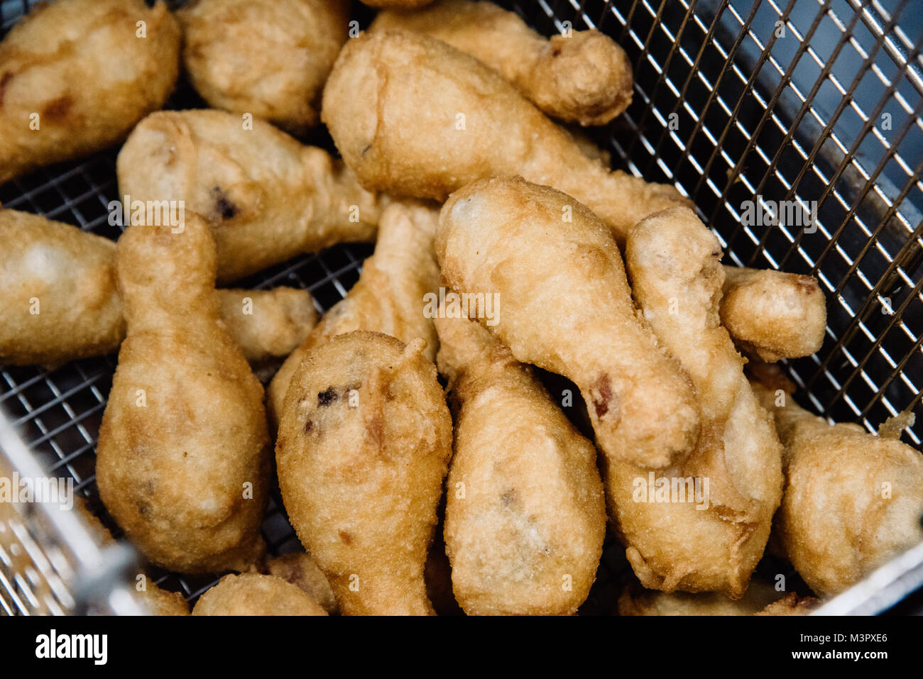 Process of making fried chicken on the kitchen. Restaurant or pizzeria ...