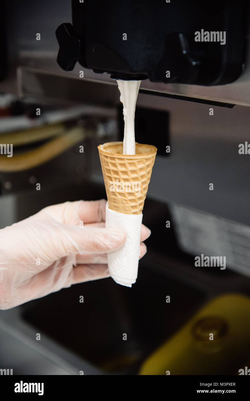 Industrial preparation of creamy ice cream on the kitchen Stock Photo ...