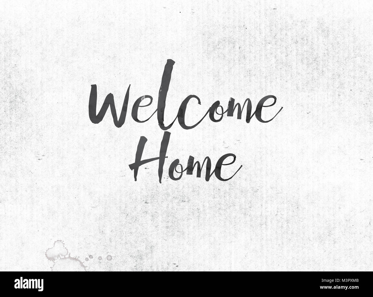 The words Welcome Home concept and theme painted in black ink on a ...