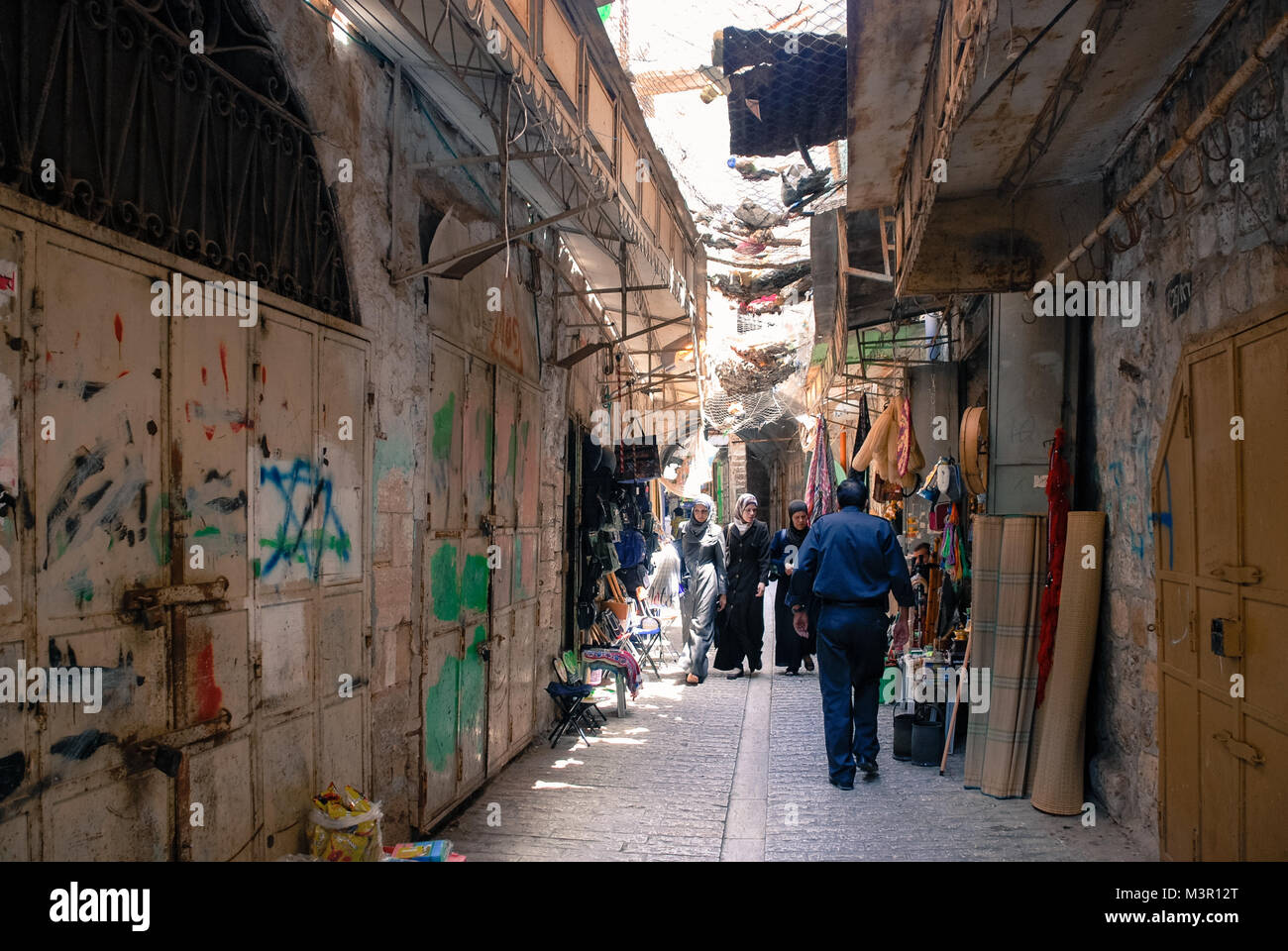 HEBRON, ISRAEL - AUGUST 04, 2010: Horizontal picture of muslim women at ...