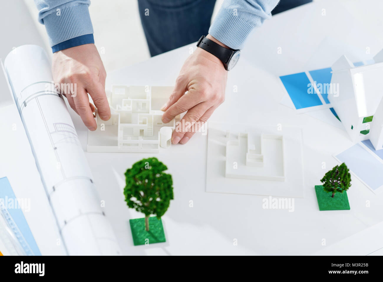Successful architect working on his project Stock Photo - Alamy