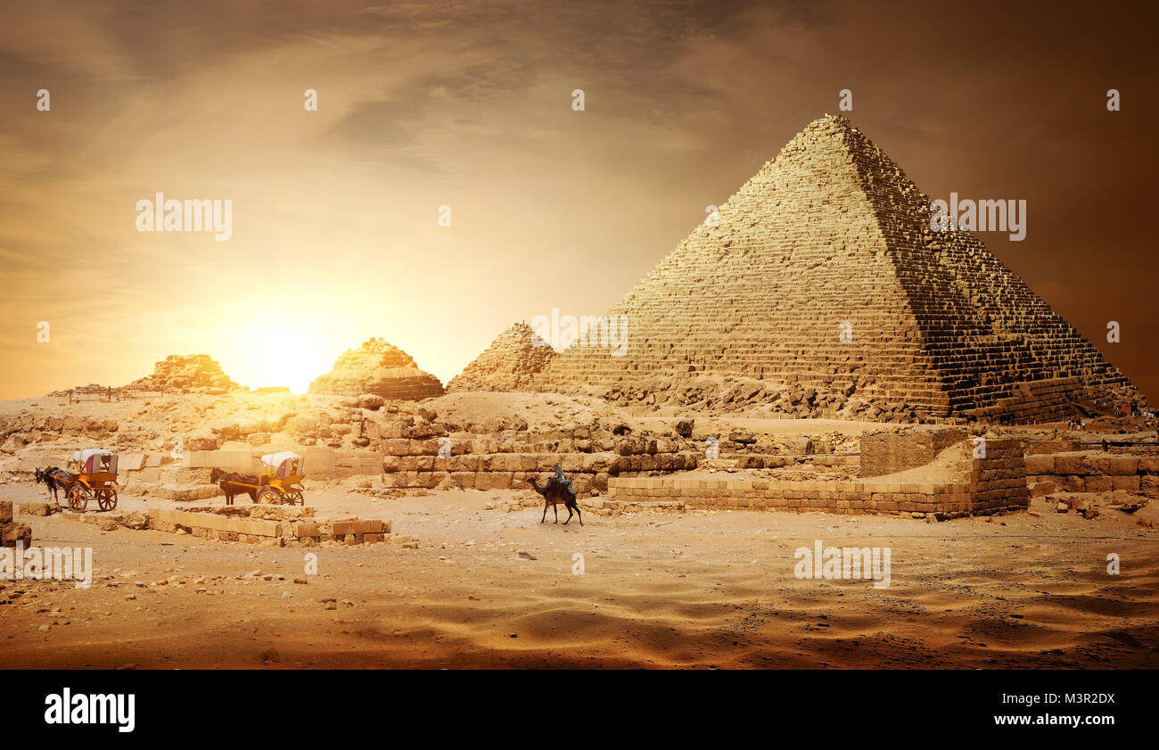 Egyptian pyramids in sand desert and clear sky Stock Photo - Alamy