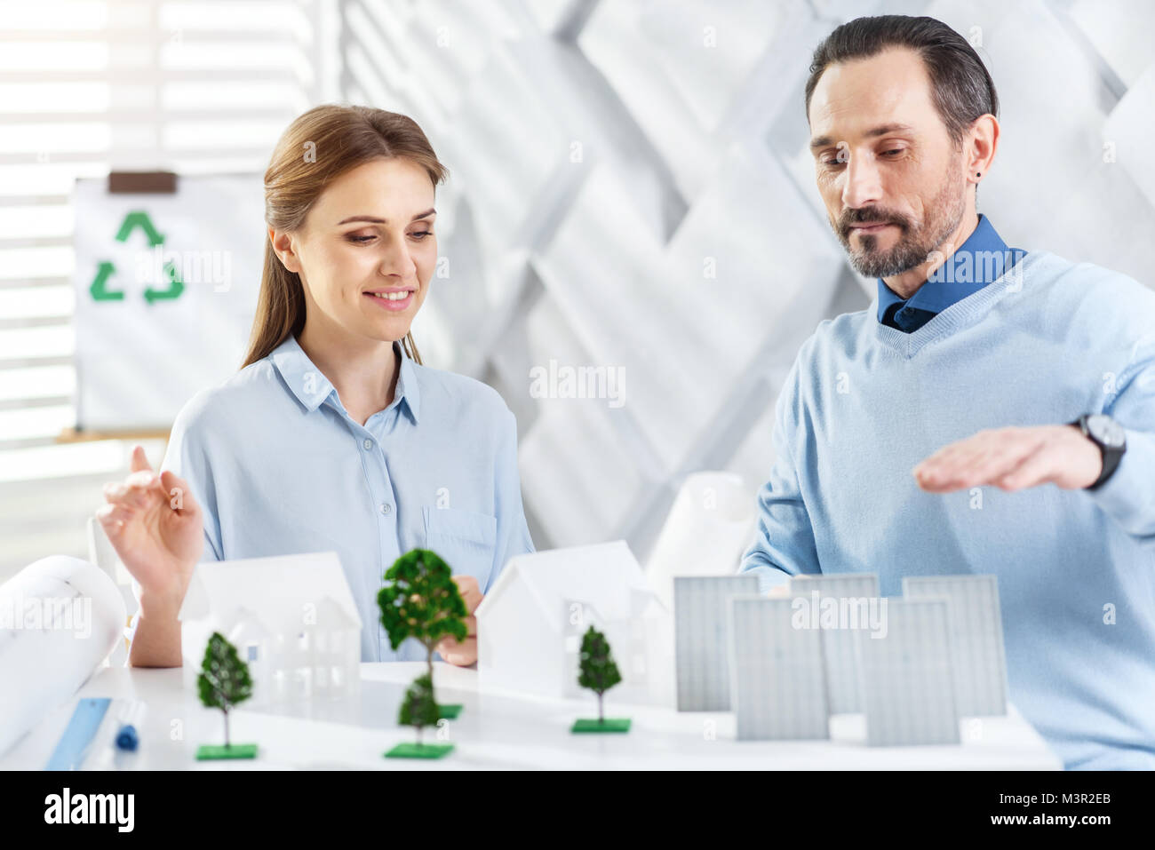 Alert colleagues working together on the project Stock Photo - Alamy