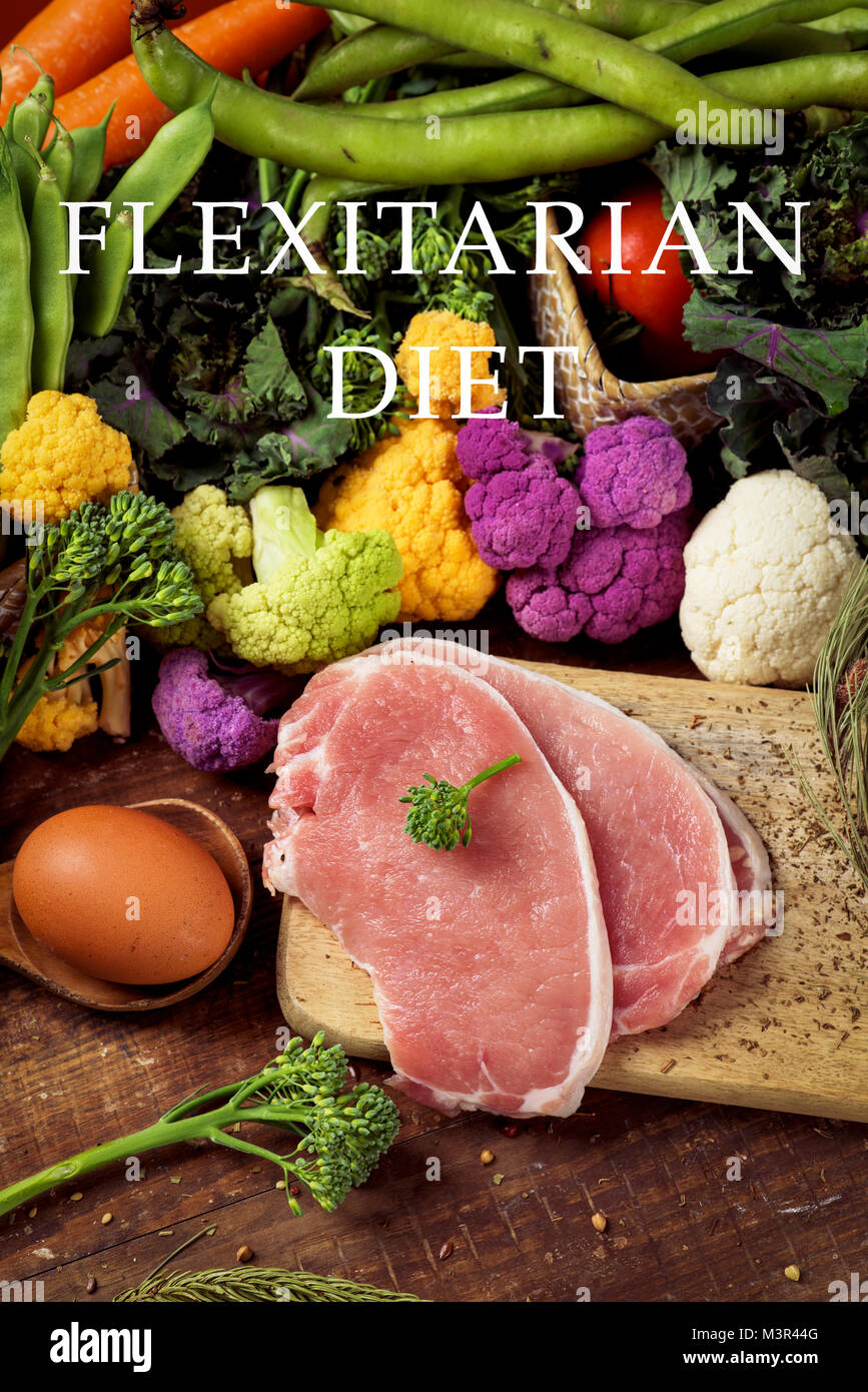 closeup of a pile of some different raw vegetables, such as cauliflower ...