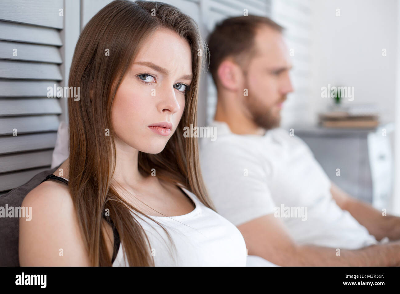 Sad young woman feeling lonely Stock Photo - Alamy