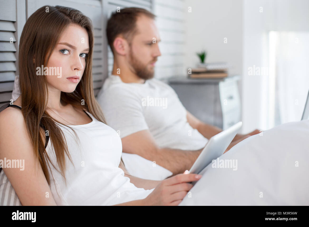 Unhappy young woman feeling lonely Stock Photo - Alamy