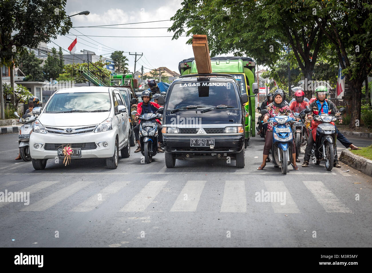 Bali, Indonesia, 28 August 2013: Traffic on streets of Bali Stock Photo ...