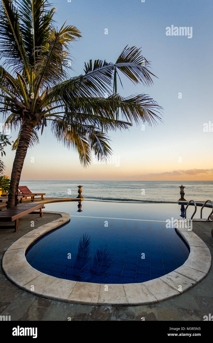 A Balinese infinity pool overlooking the Indian Ocean during a glorious ...