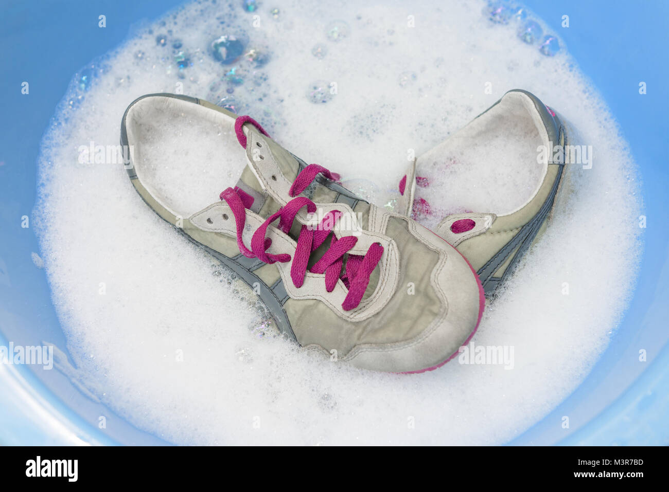 washing the dirty sneakers at home, cleaning the shoes Stock Photo - Alamy