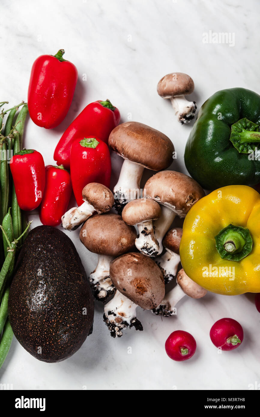 a variety of fresh Vegetables background on a white marble table. place ...