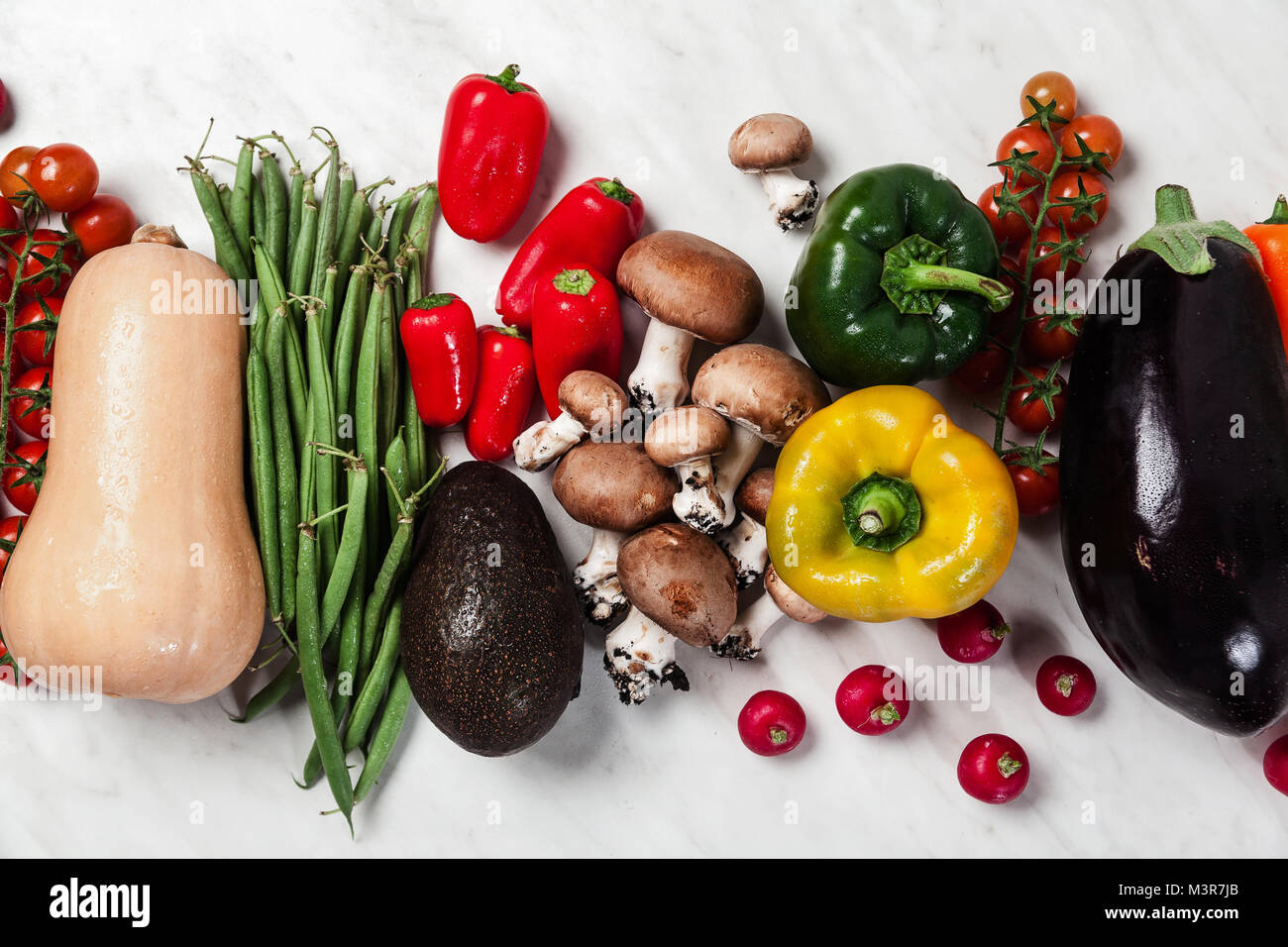 a variety of fresh Vegetables background on a white marble table. place ...