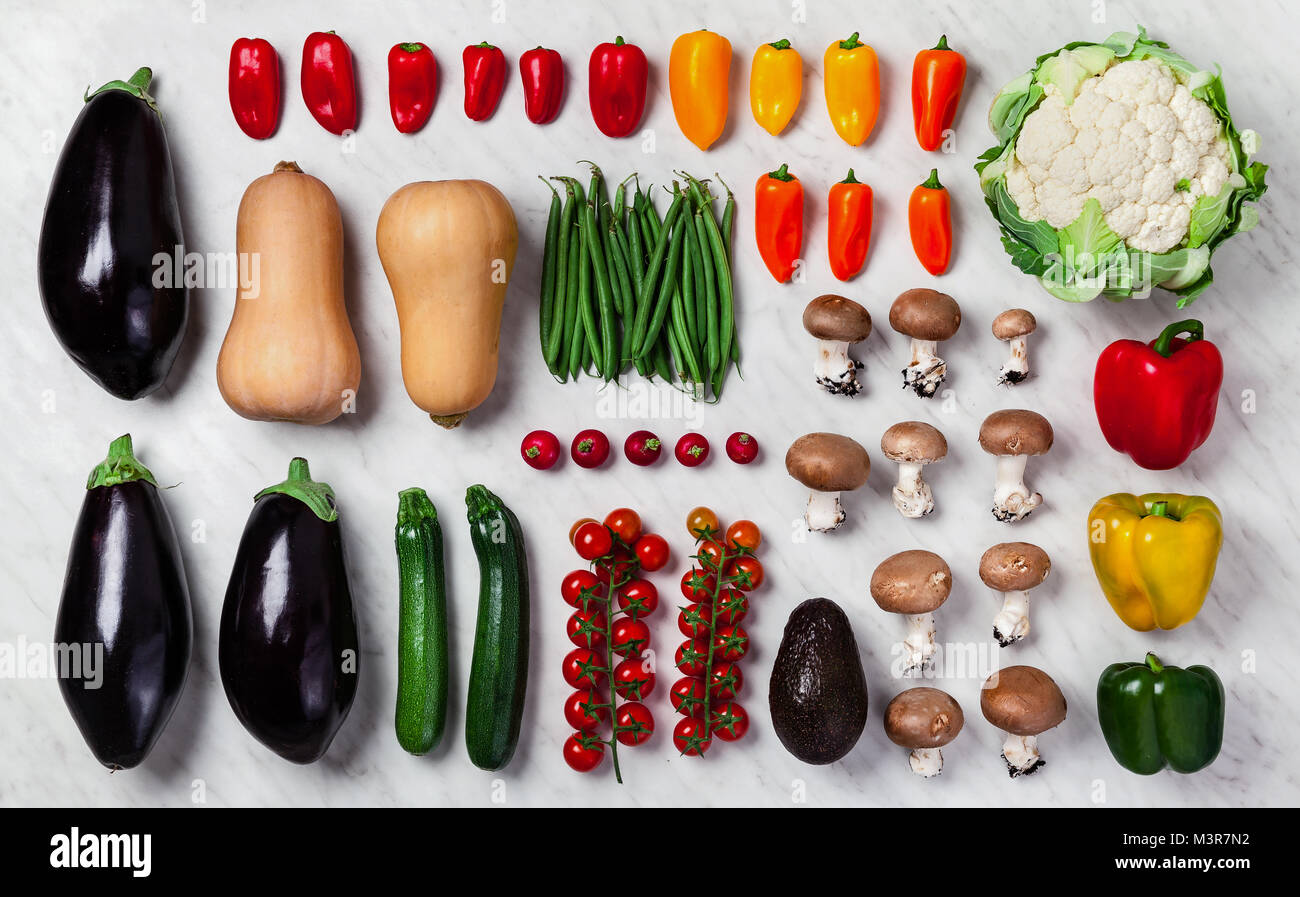 a variety of fresh Vegetables background on a white marble table. place ...