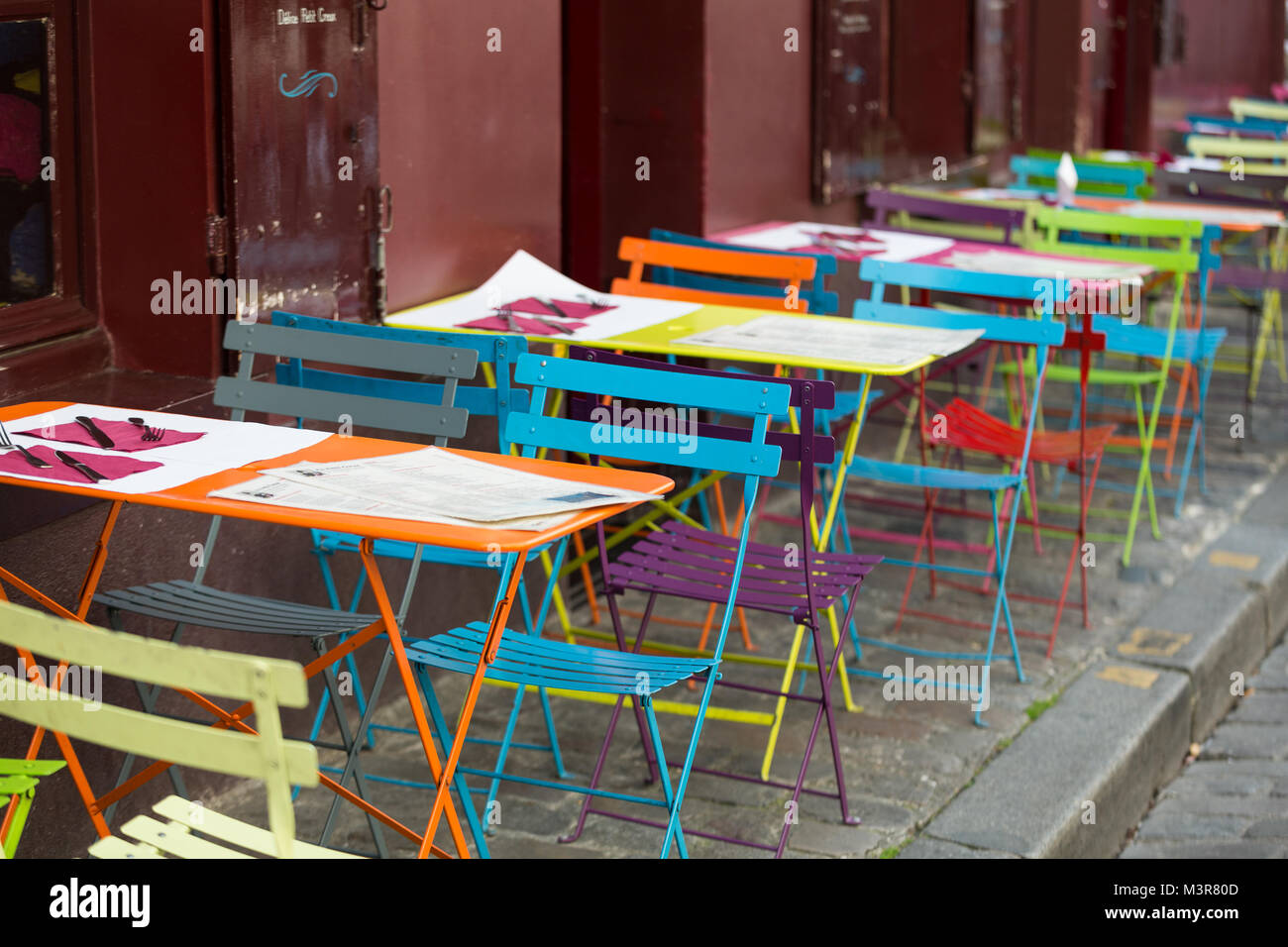 Paris - Very colorful Parisian outdoor cafe in Montmartre Stock Photo ...