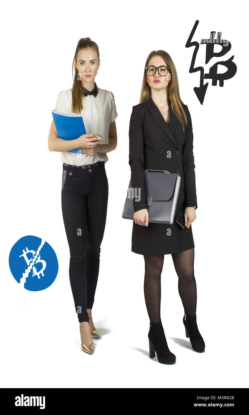 Beautiful women standing over white background with bitcoin sketches ...