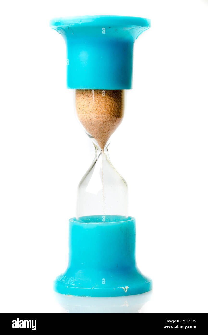 Sand flowing through an hourglass concept for time running out ...