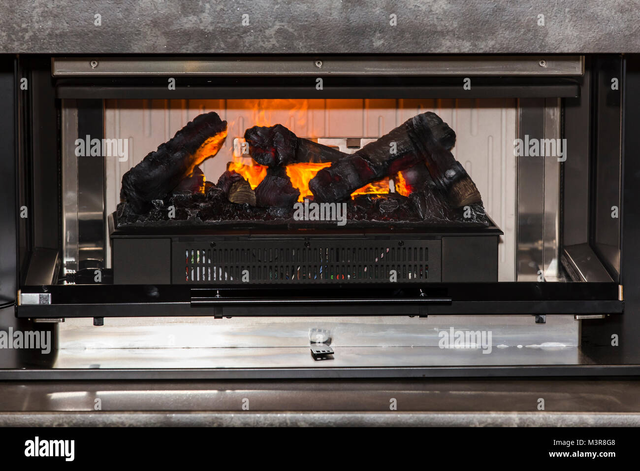 electric fireplace with artificial sparkling flame, decor for the ...