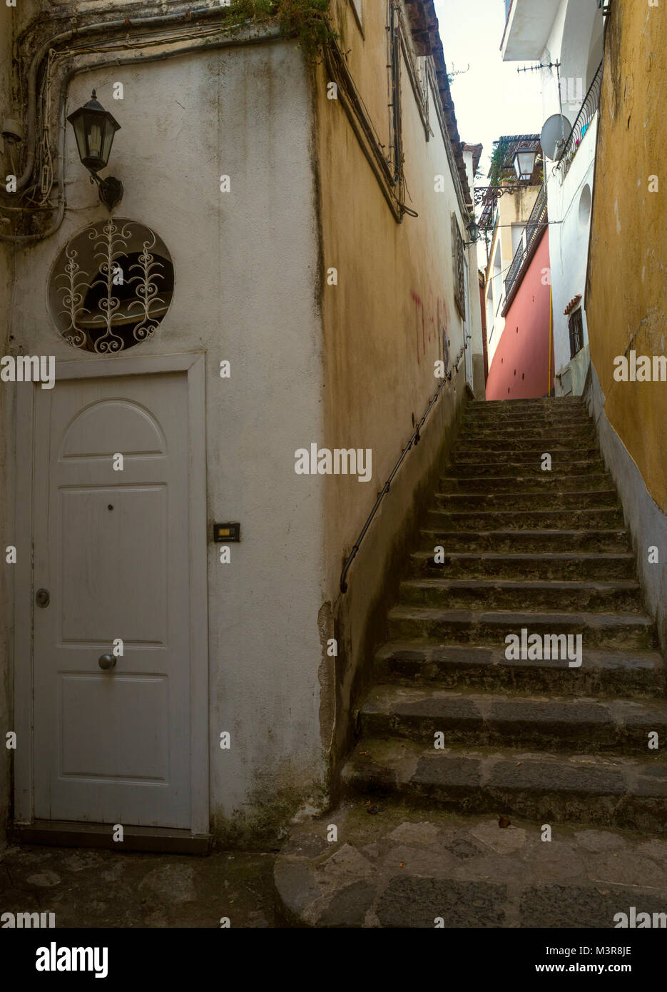 Cozy narrow italian street Stock Photo - Alamy