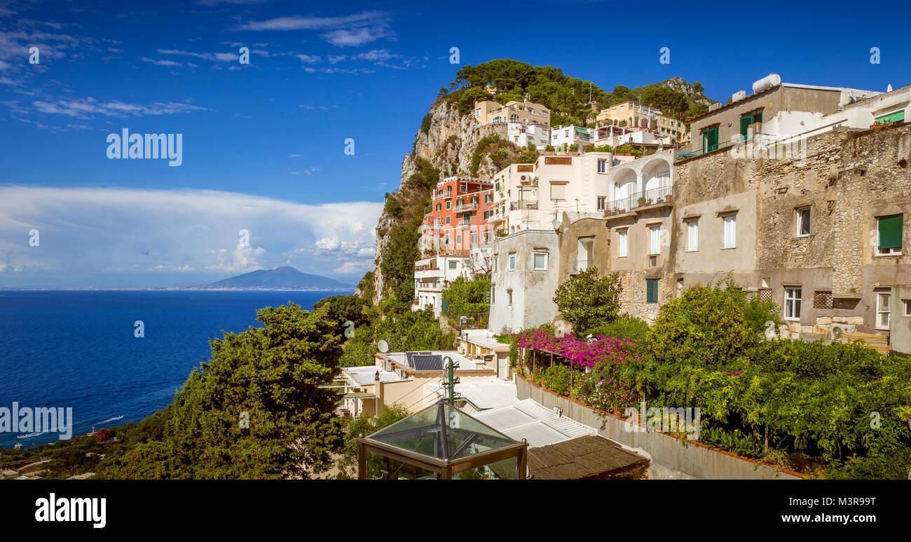 Capri town on Capri Island with Vesuvius volcano and Naples in the ...
