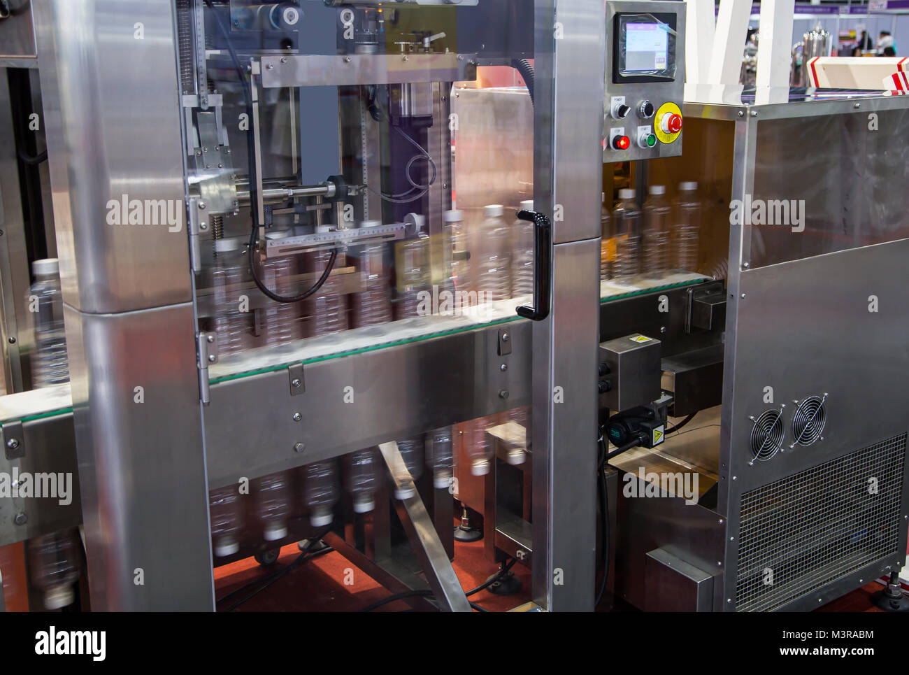 Production of mineral water bottle packing machine Stock Photo - Alamy